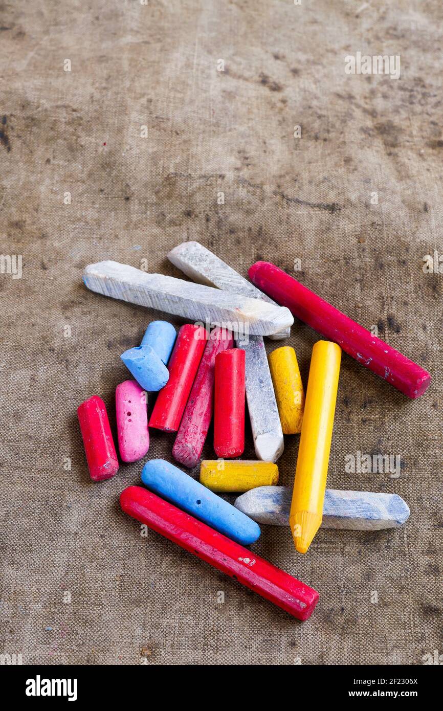Old chalks displayed on a canvas background, France Stock Photo - Alamy