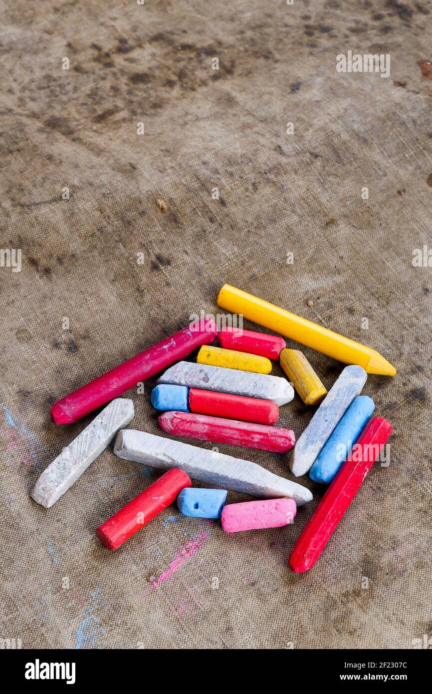 Old chalks displayed on a canvas background, France Stock Photo - Alamy