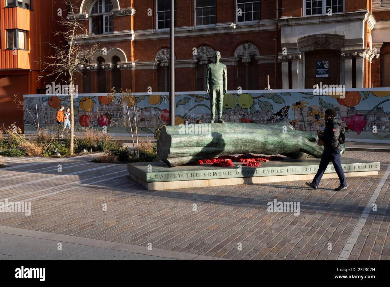 The bronze sculpture of a boy forms part of the artwork by Kenny Hunter ...