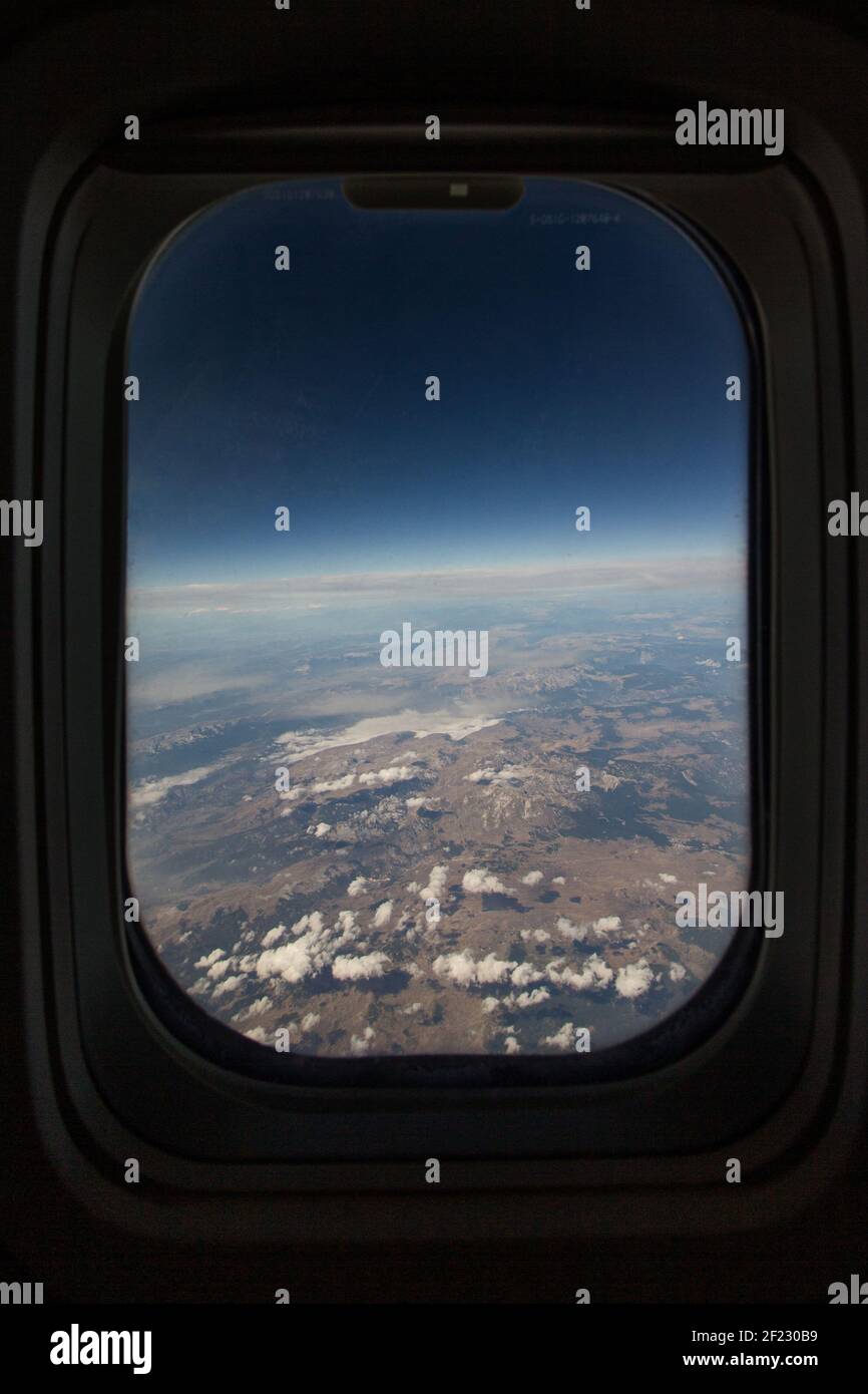 A view of an airplane window. Beautiful view through plane window Stock ...