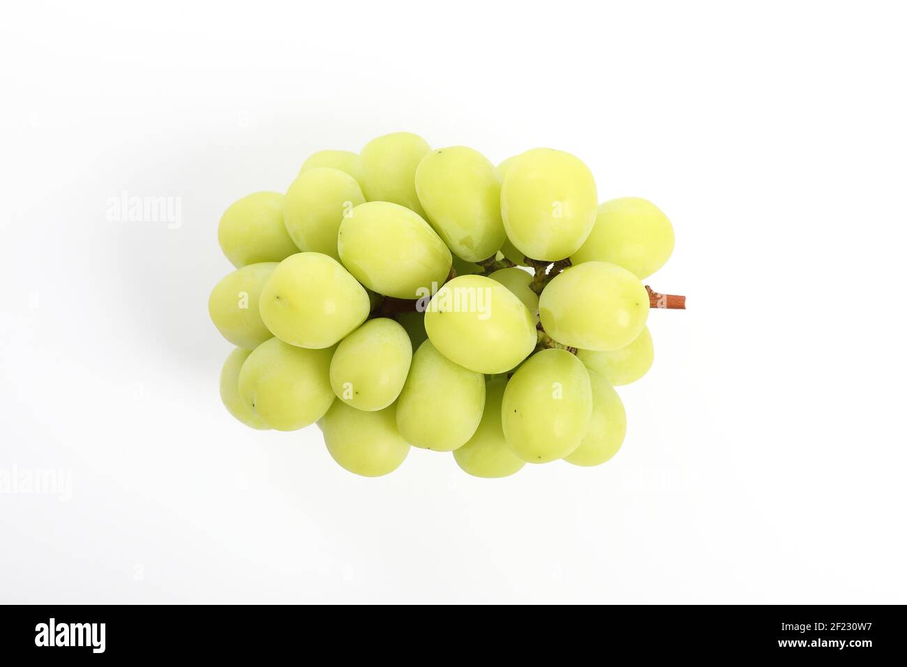 Green grape isolated in white background Stock Photo - Alamy