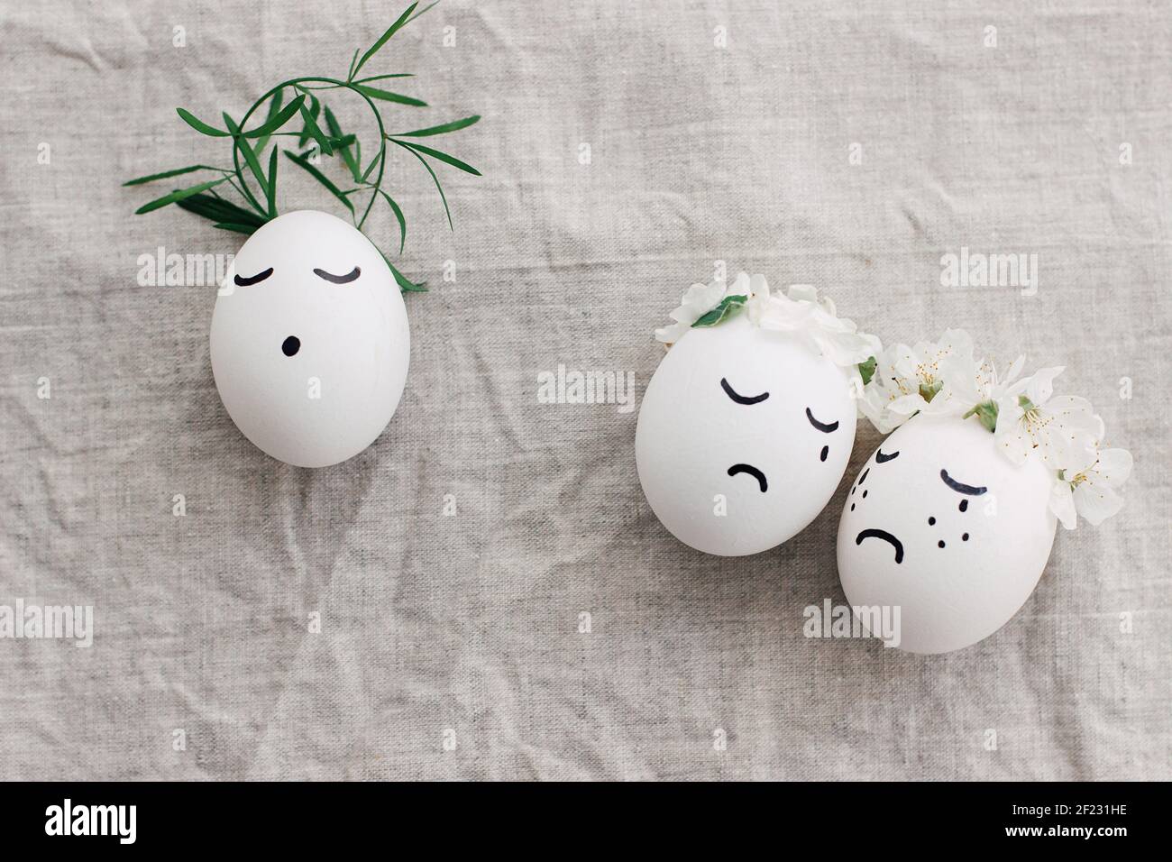 Easter concept. Natural eggs with sad crying and calm faces in cute ...