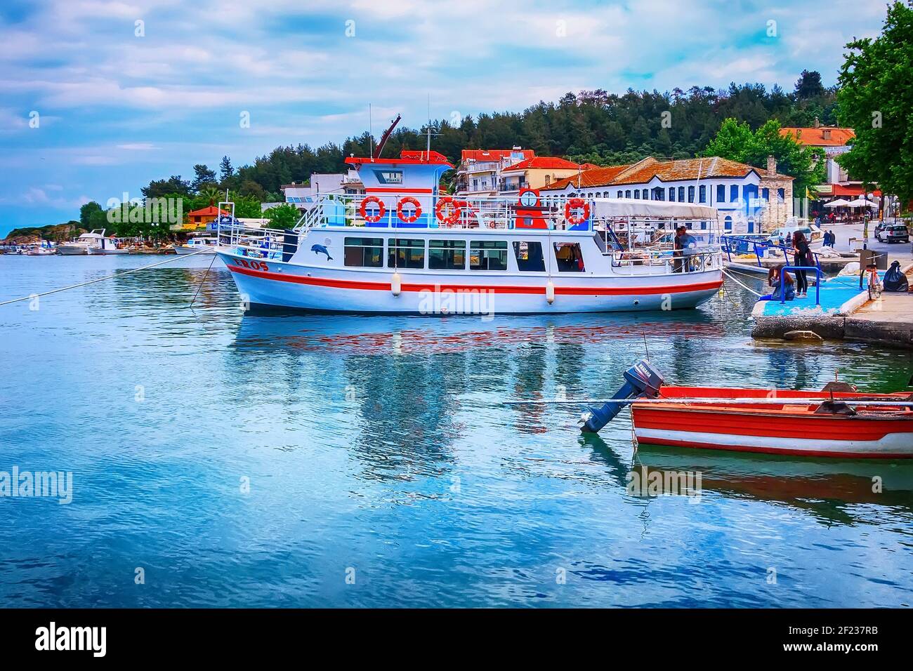 Greece, Thasos port with boats and promenade view Stock Photo - Alamy