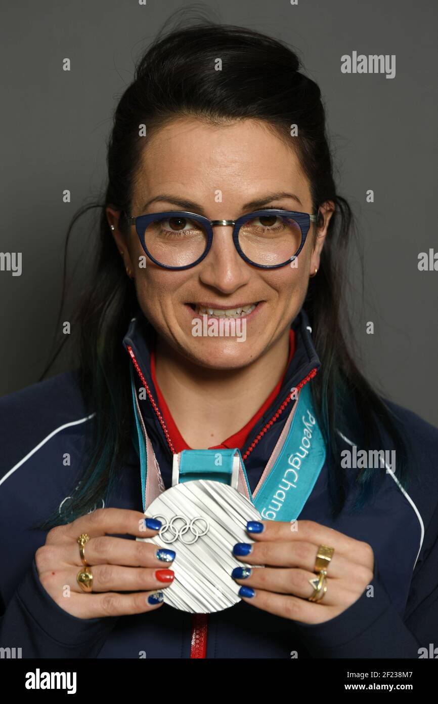 Marie Martinot pose with his silver medal during the XXIII Winter ...