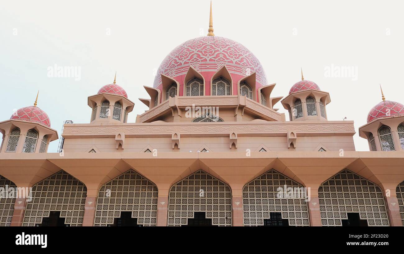 The Putra Mosque, also known as the Pink Mosque, in Putrajaya Malaysia ...