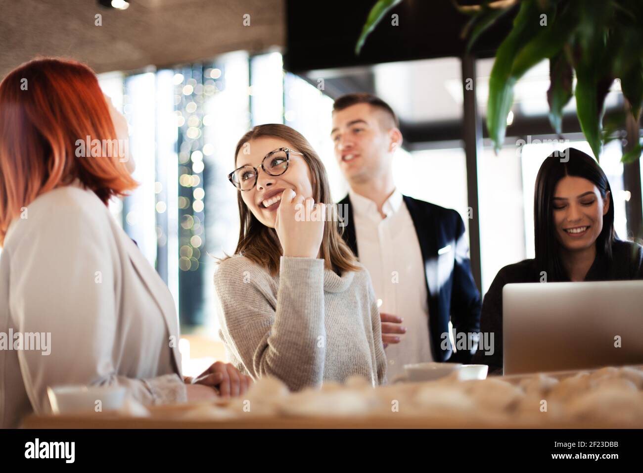 business people having fun at creative meeting in a cafe out of office ...