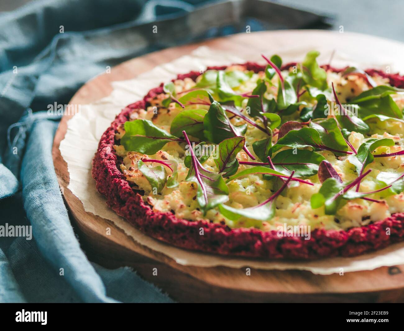Beetroot pizza crust with fresh mangold leaves Stock Photo - Alamy