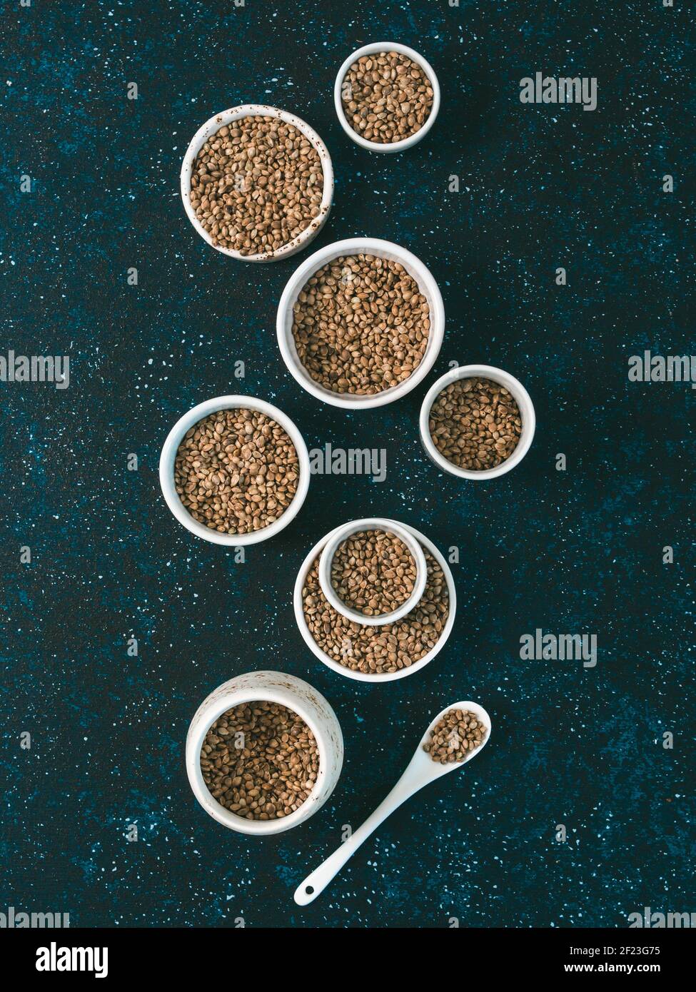 Hemp seeds flat lay vertical Stock Photo - Alamy