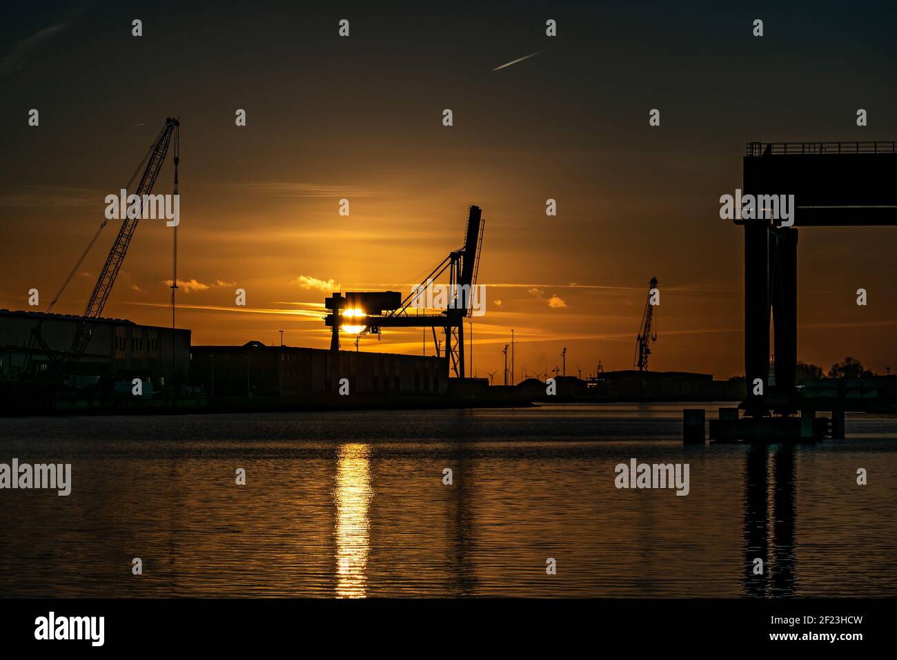 The beautiful sunset at a shipping port Stock Photo - Alamy
