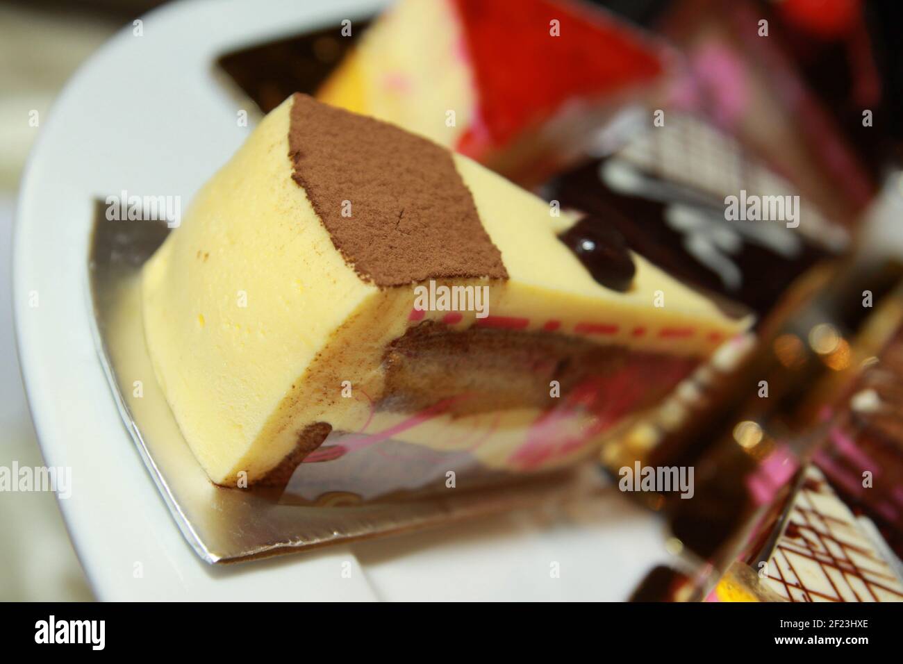 A closeup shot of a delicious tiramisu piec Stock Photo - Alamy