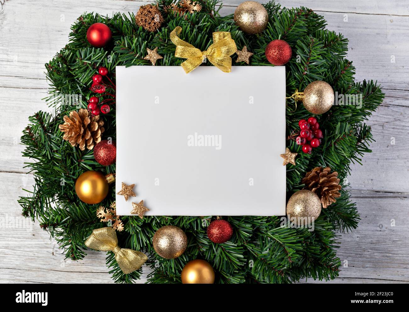 Christmas tree branches with paper card note Stock Photo - Alamy