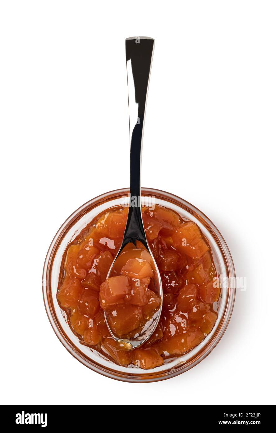 Spoon on the saucer with jam Stock Photo - Alamy