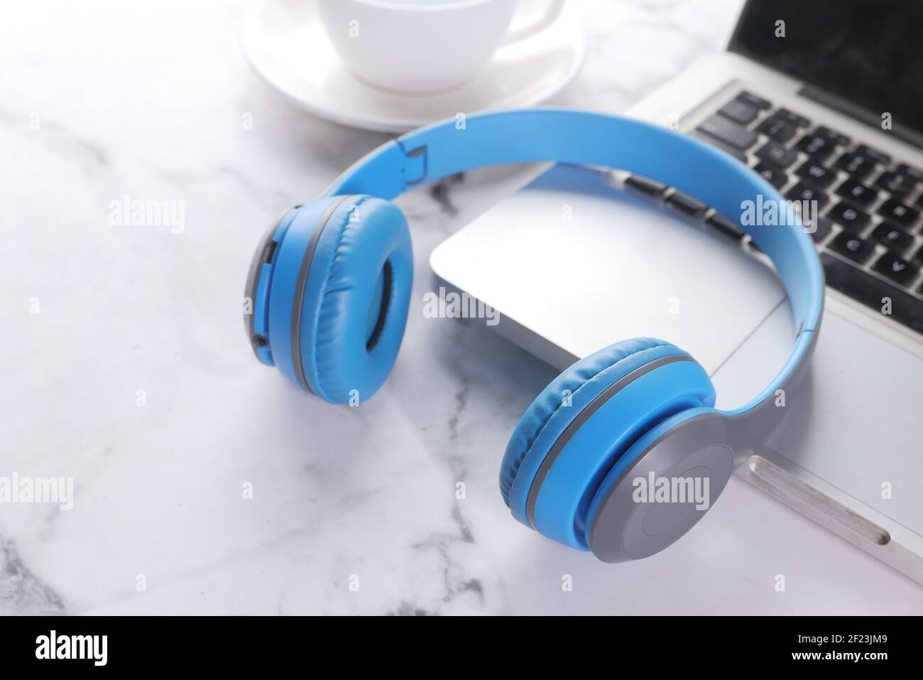 Headphone on laptop copy hi-res stock photography and images - Alamy