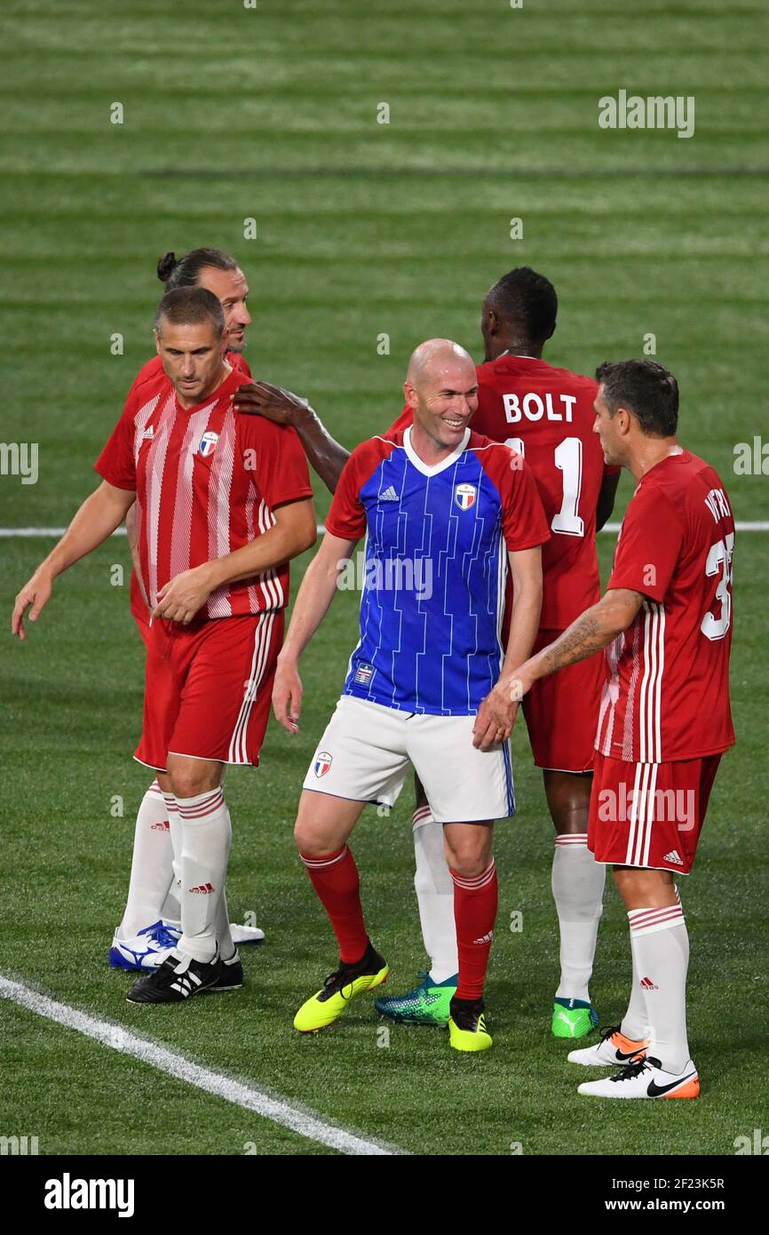 Former football player Zinedine Zidane and former track and field athlete Usain Bolt during the ...