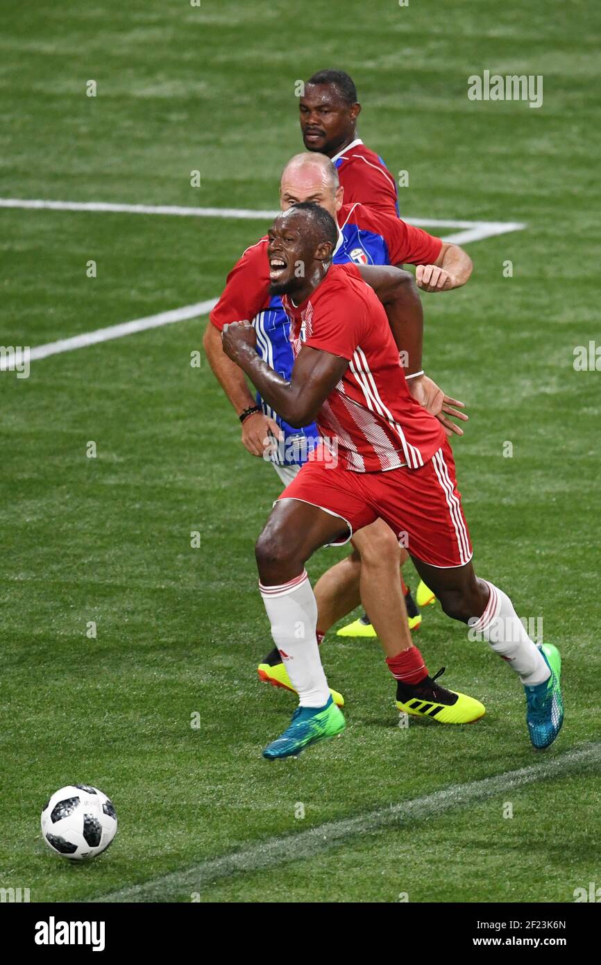 Former track and field athlete Usain Bolt and former football player ...