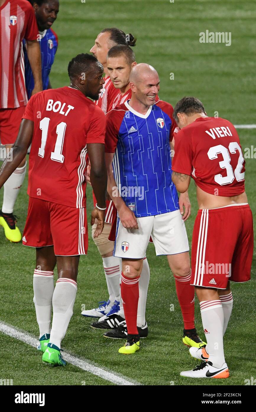 Former football player Zinedine Zidane and former track and field athlete Usain Bolt during the ...