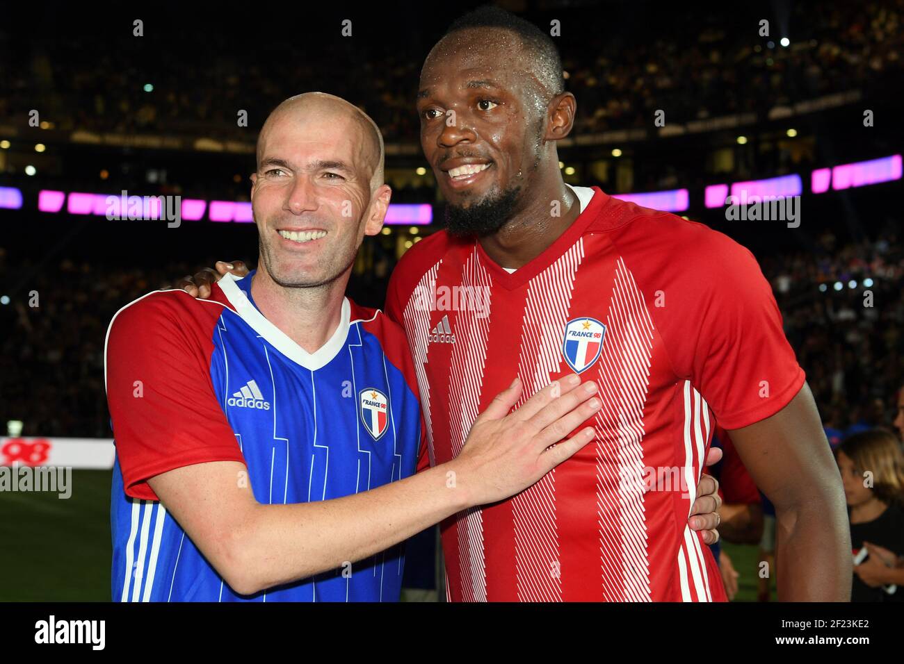 Former football player Zinedine Zidane and former track and field athlete Usain Bolt during the ...