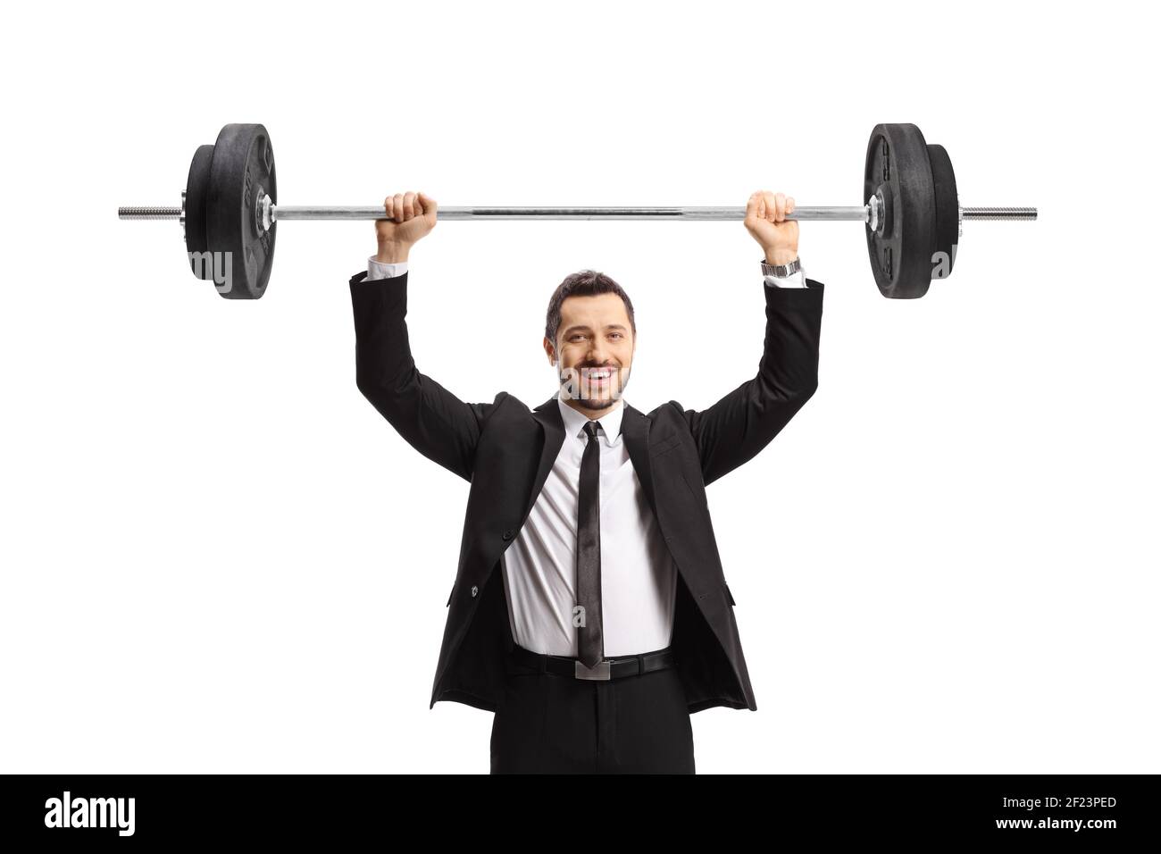 Businessman lifting weights and smiling isolated on white background ...