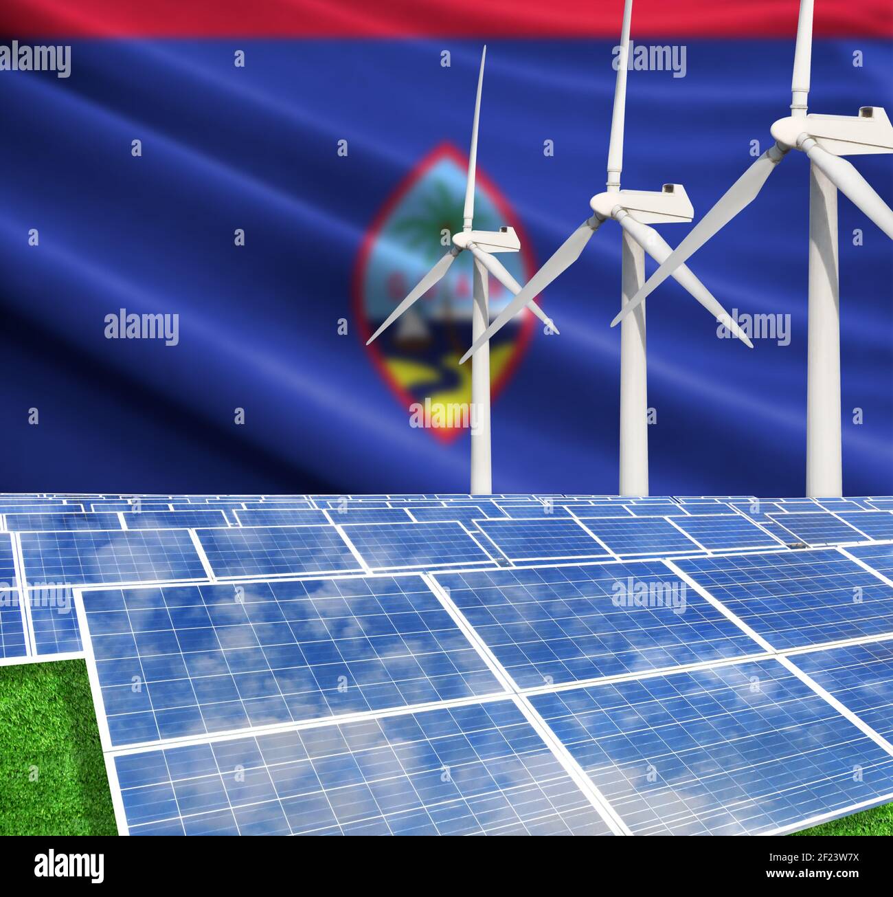 Solar panels on the background with the flag of Guam and Wind Turbine ...