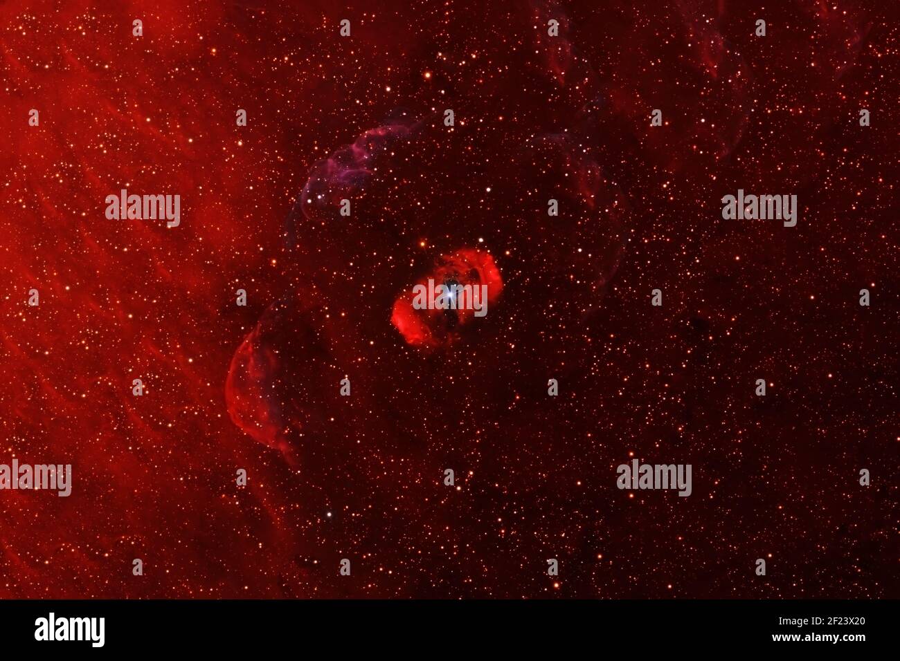Galaxy in red colors. Elements of this image were furnished by NASA ...