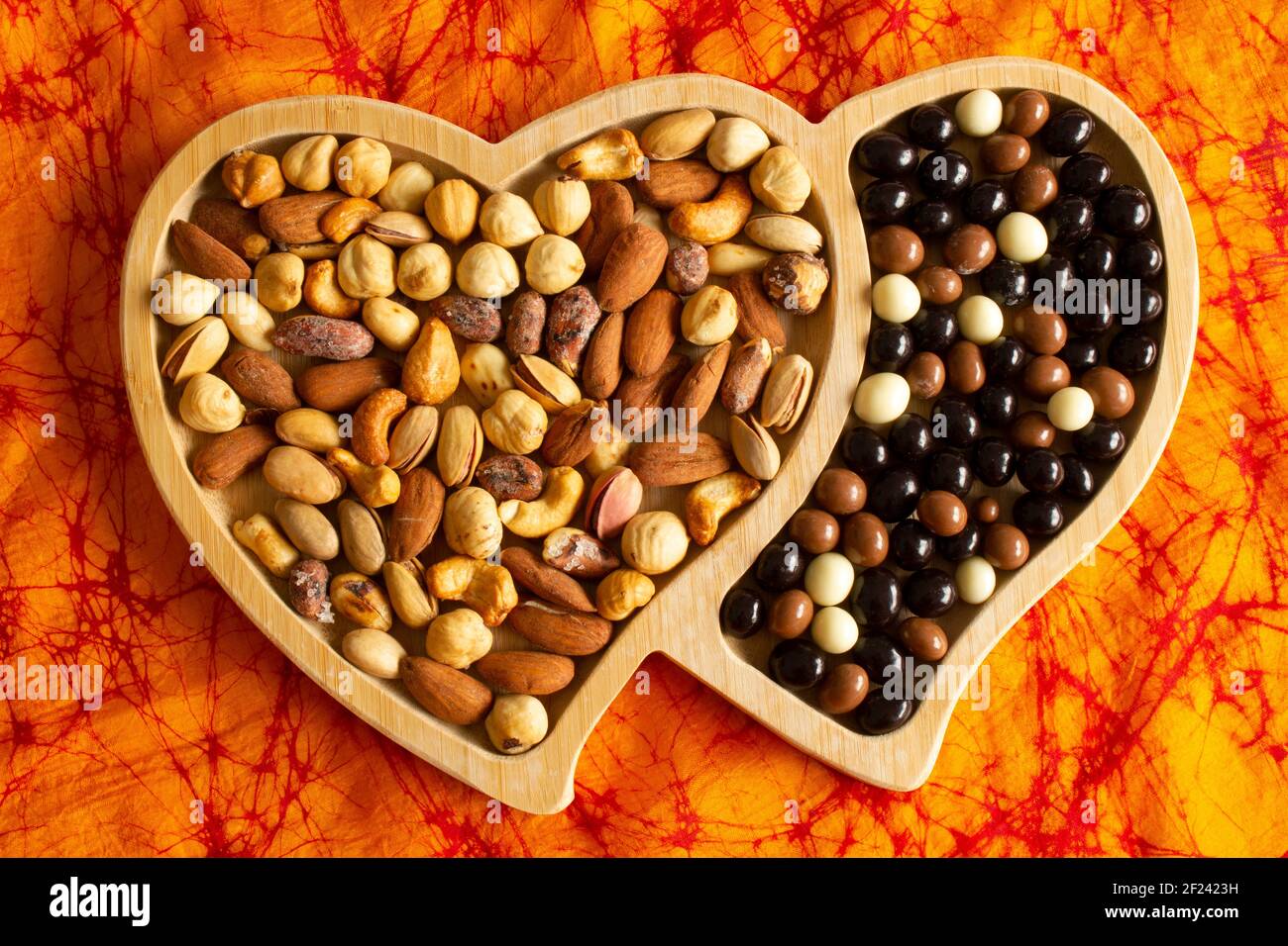 Mixed nuts and chocolate balls Stock Photo - Alamy