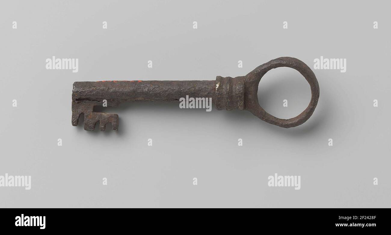 Pijpsleutel.Pipe key with round eye, resting on a deeply grooved key ...