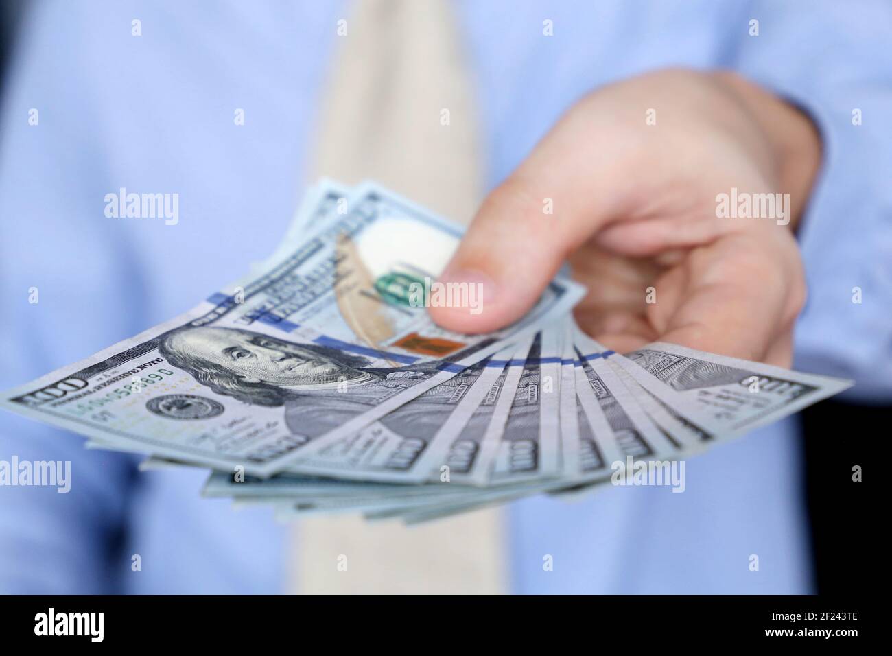 Hand dollars hi-res stock photography and images - Alamy