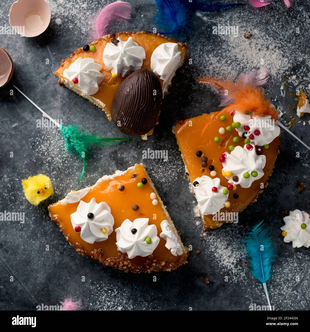 high angle view of some pieces of mona de pascua, a cake eaten in Spain ...