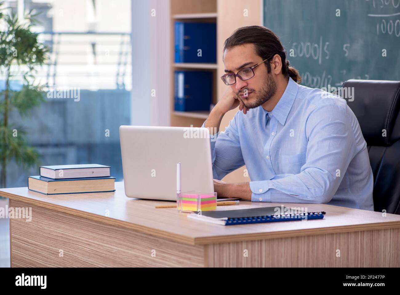 Concerned teacher hi-res stock photography and images - Alamy