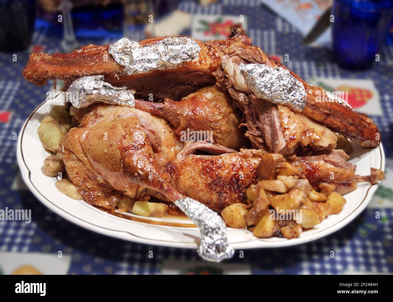 oven-roasted goose with apples, cut into chunks. celebratory dish ...