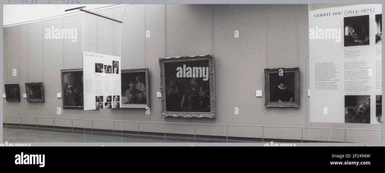 Room with paintings by Rembrandt students and two information panels ...