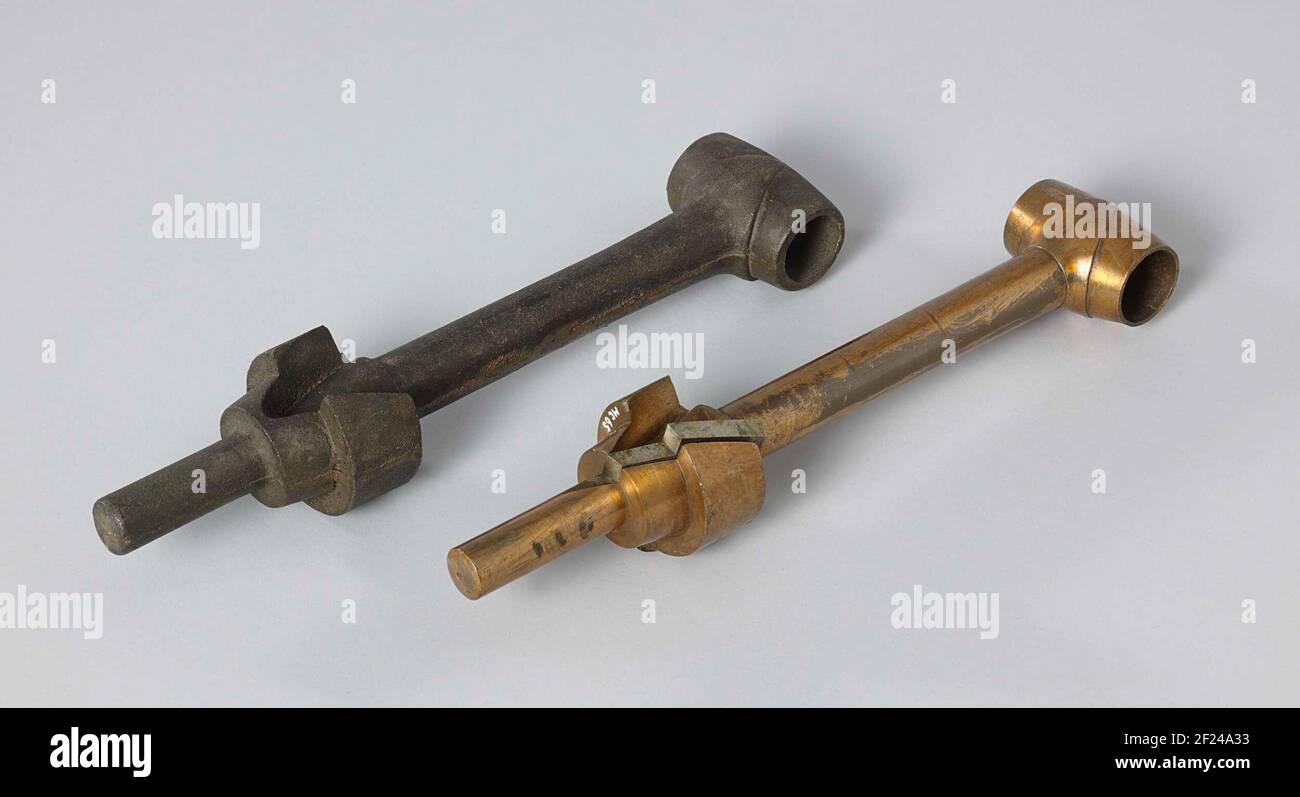 Two Rabbet Planes.Two bronze drilling shafts, the one finished, the ...