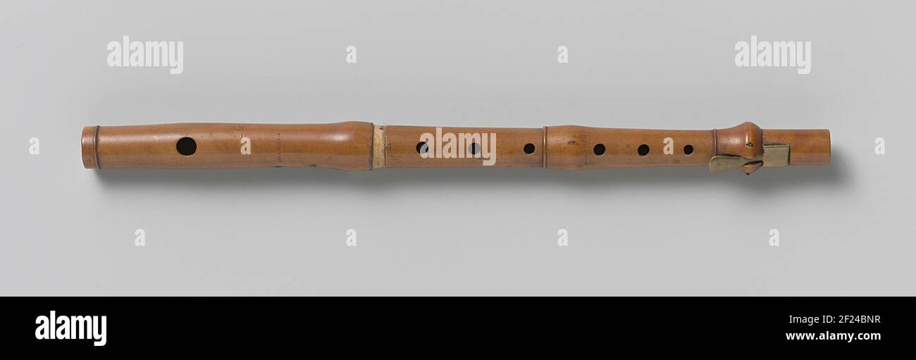 Piccolo Flute.Piccolo of palm wood with a valve. Plush, intermediate ...