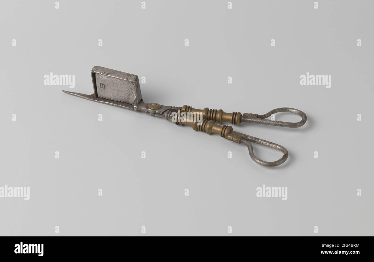 An iron with copper mounted guy Stock Photo - Alamy