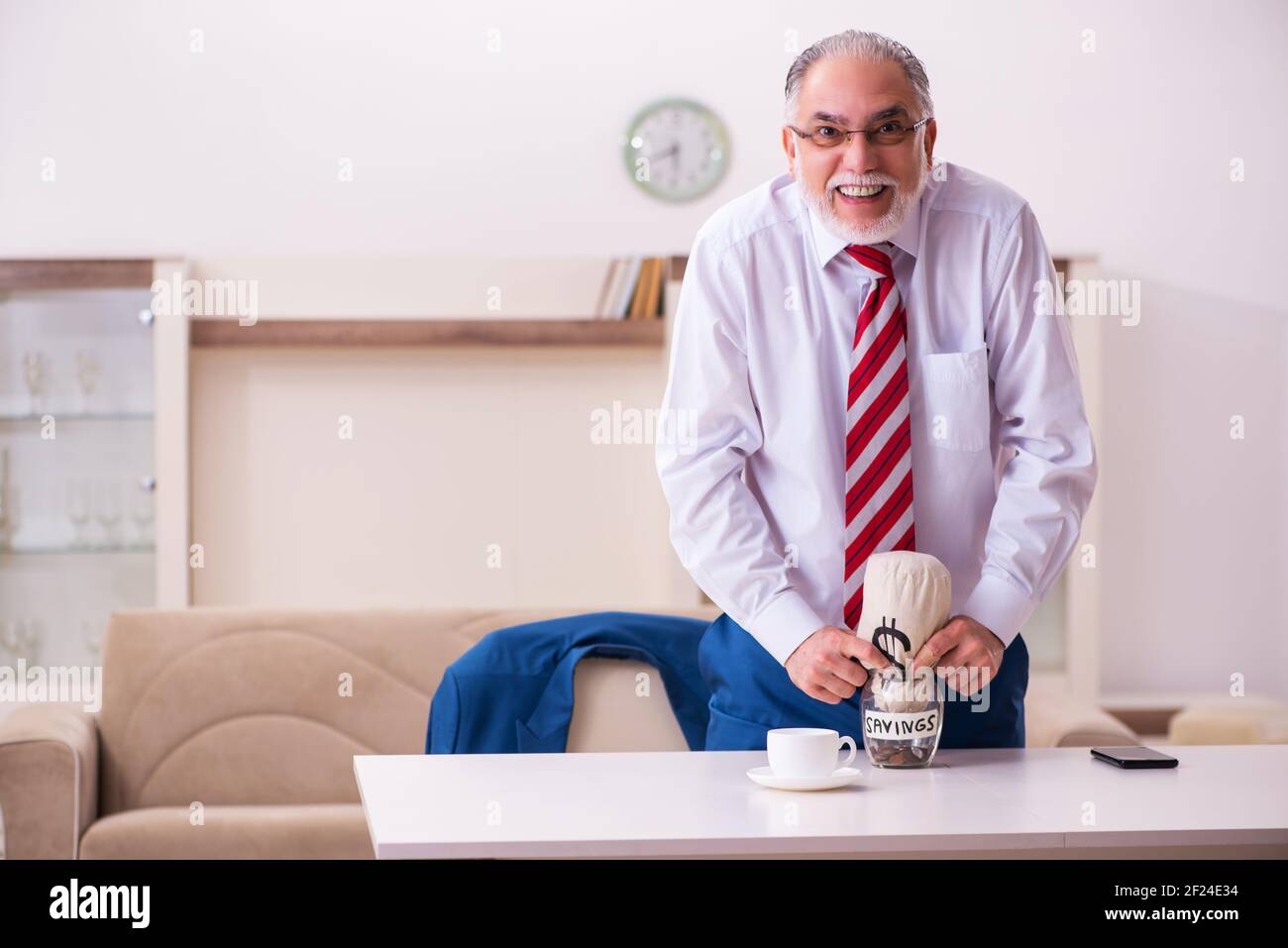 Old male boss employee in retirement concept Stock Photo - Alamy