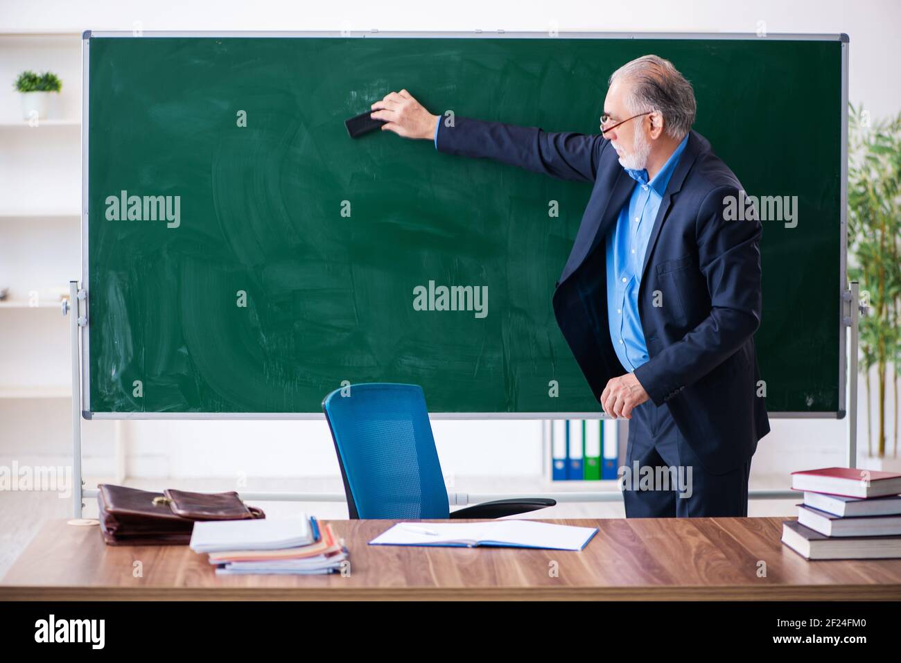 Old male math teacher hi-res stock photography and images - Alamy