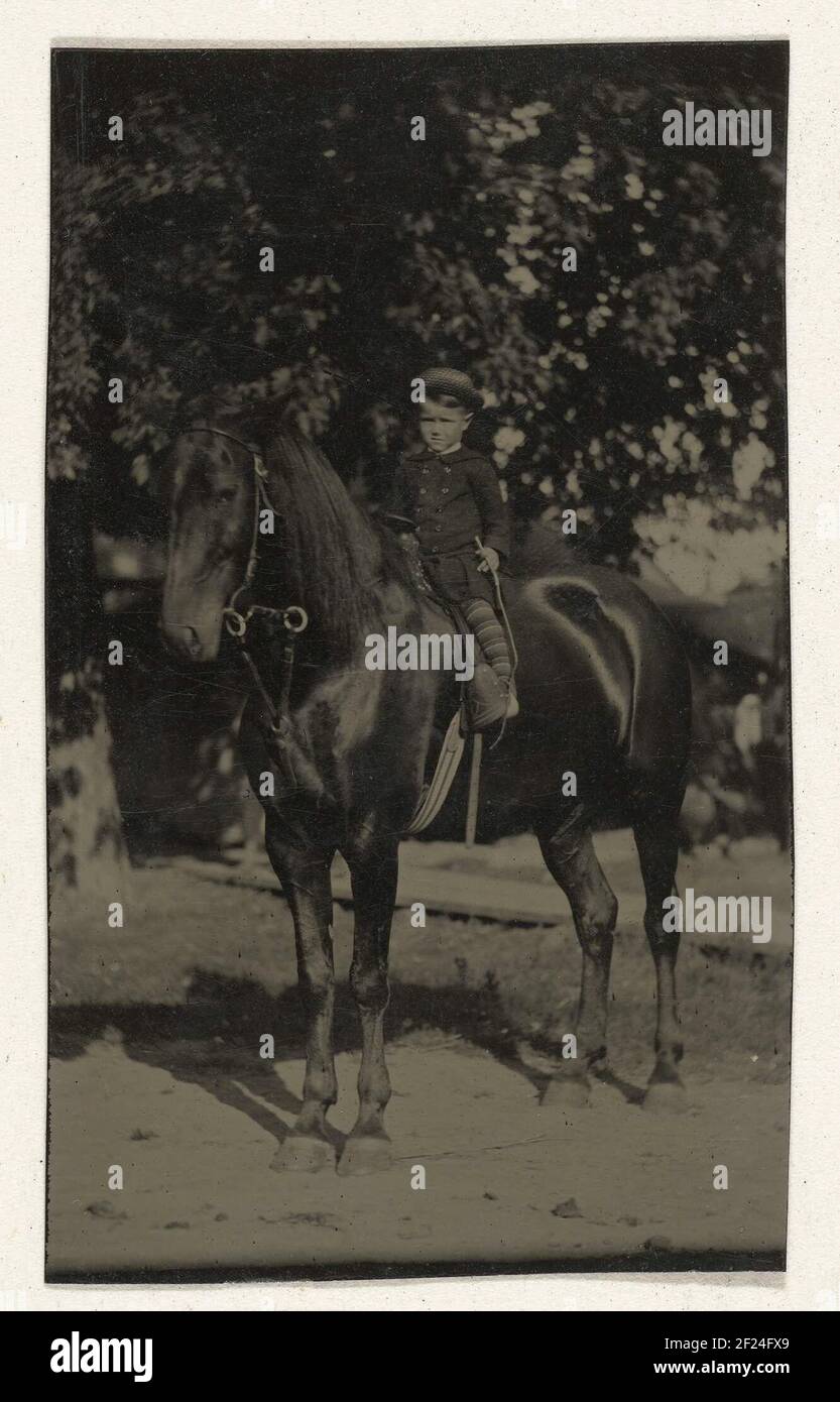 Boy on horseback Stock Photo - Alamy
