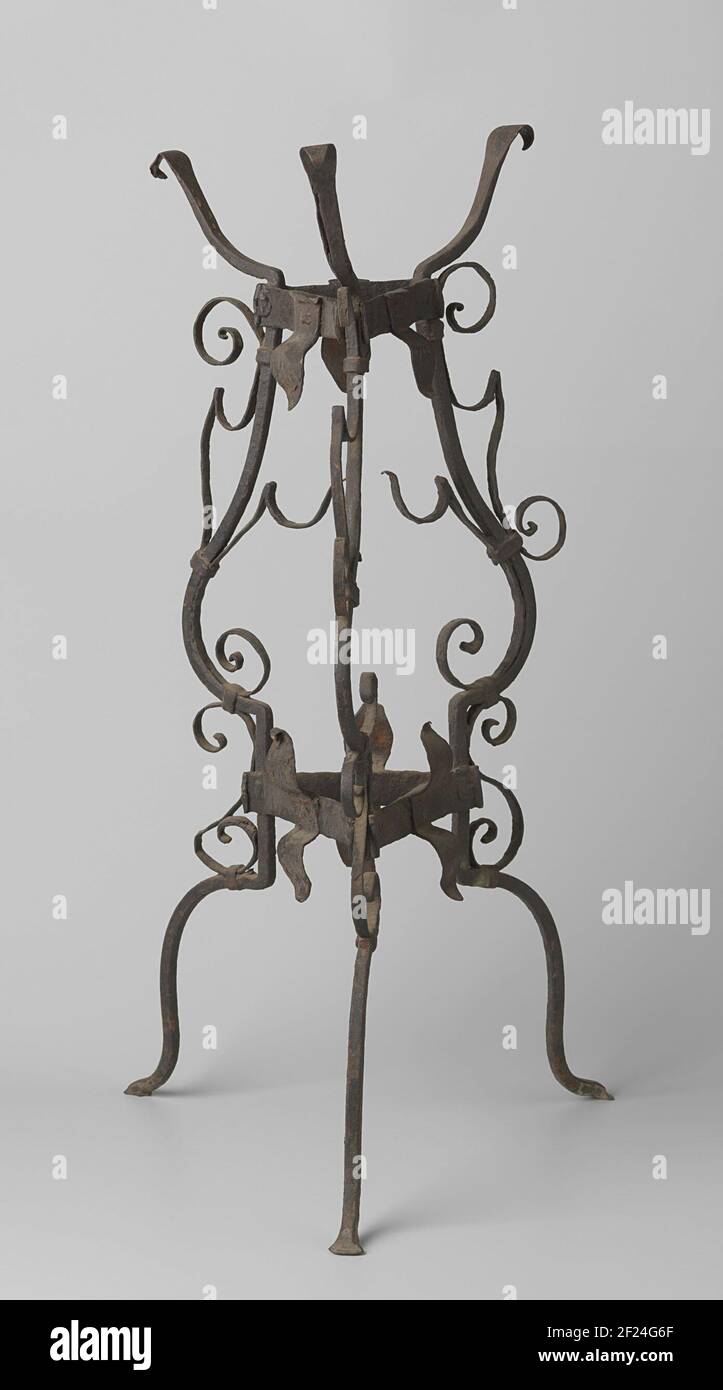 Drievoet.A forged iron standard, tripod, here and there defect Stock ...