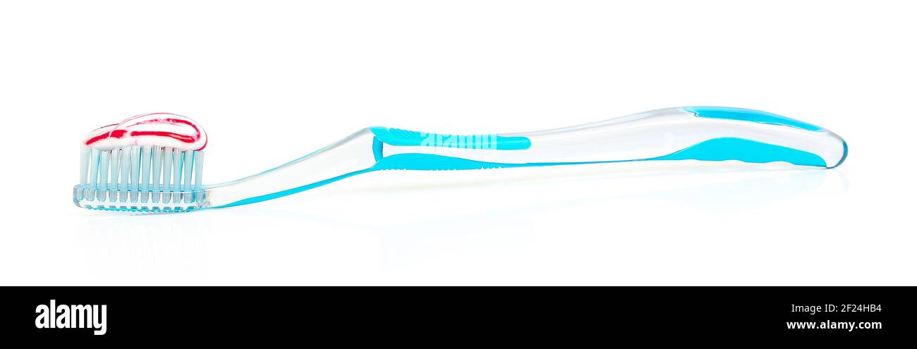 transparent toothbrush with toothpaste isolated on white Stock Photo ...