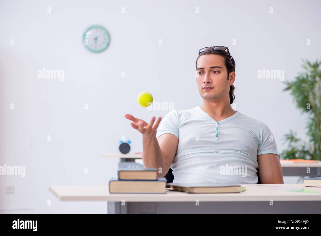 Throwing book classroom hi-res stock photography and images - Alamy