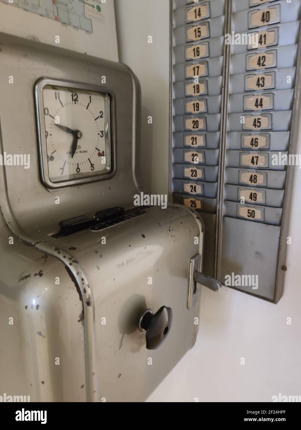 old job office clock work badge check machine Stock Photo - Alamy