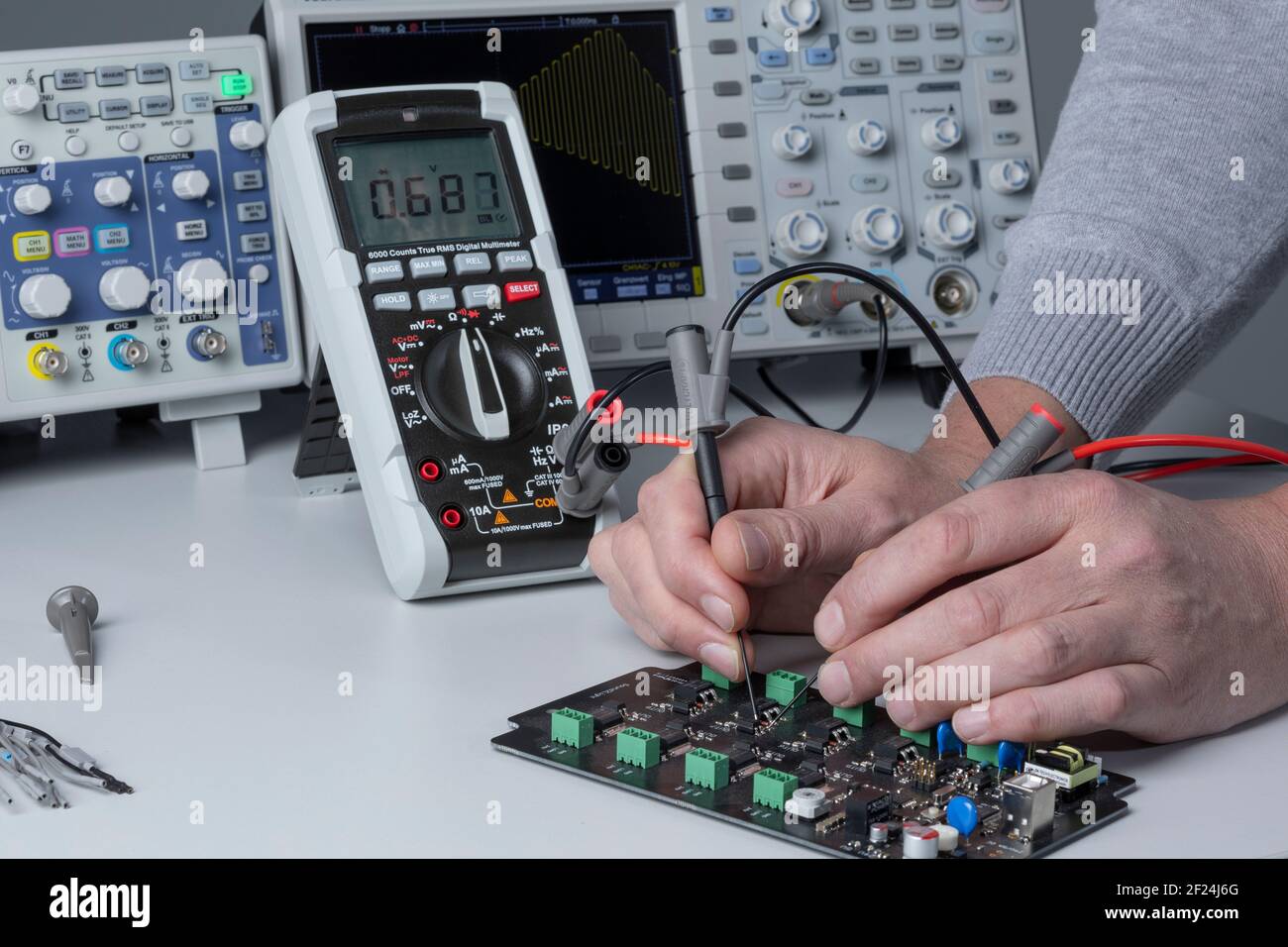 Detail of electronic works on a work bench in laboratory Stock Photo ...