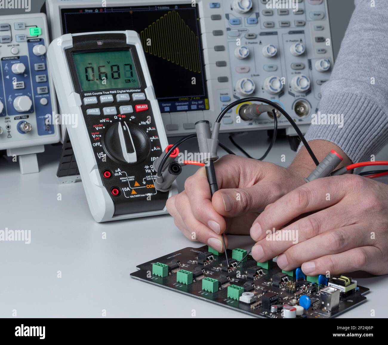 Detail of electronic works on a work bench in laboratory Stock Photo ...