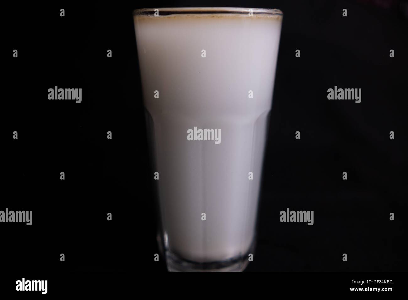 Glass of traditional Mexican horchata water with black background Stock ...