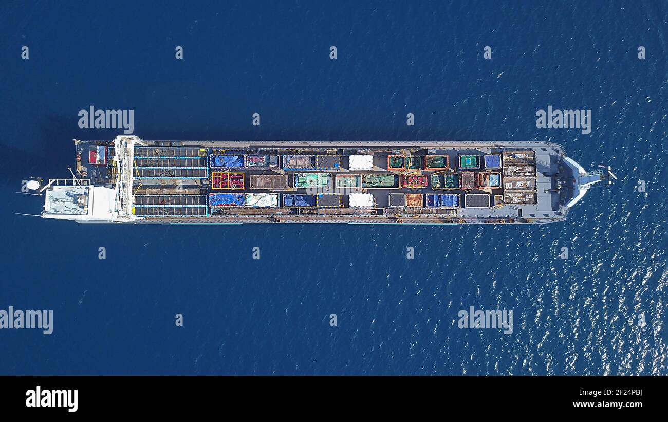 Container Cargo ship loaded. Unusual and colorful medium size ...