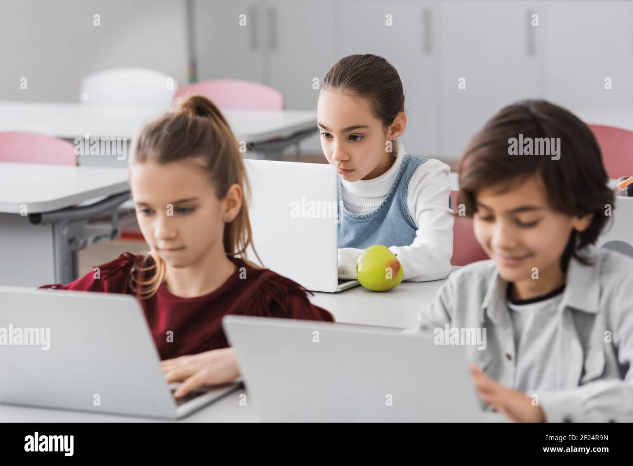 2 or more preteen friends study laptops hi-res stock photography and ...
