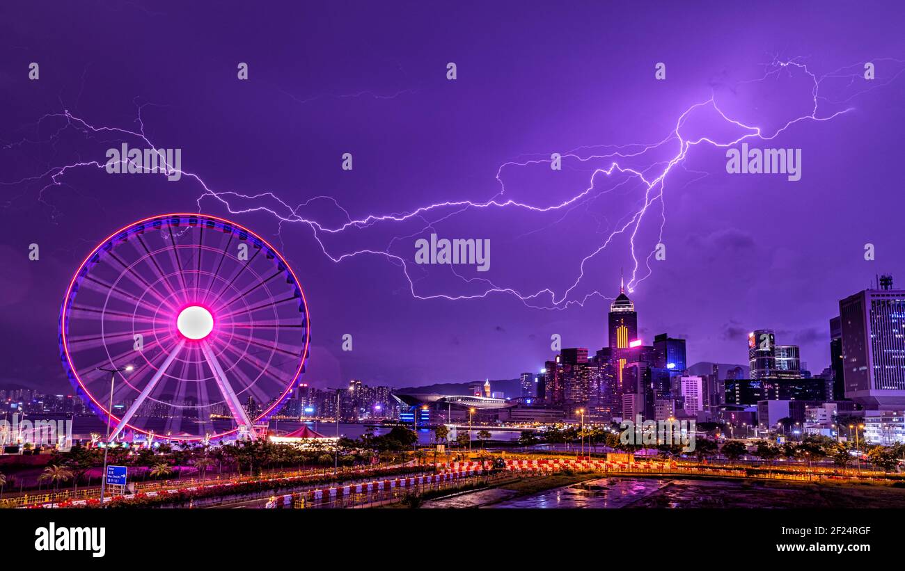 Lightning over city - Victoria Harbour, Hong Kong Stock Photo - Alamy