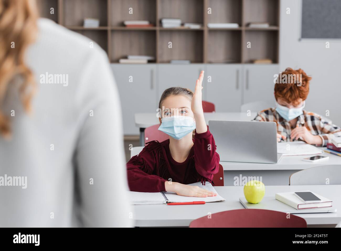 Kids raising hand laptop hi-res stock photography and images - Alamy