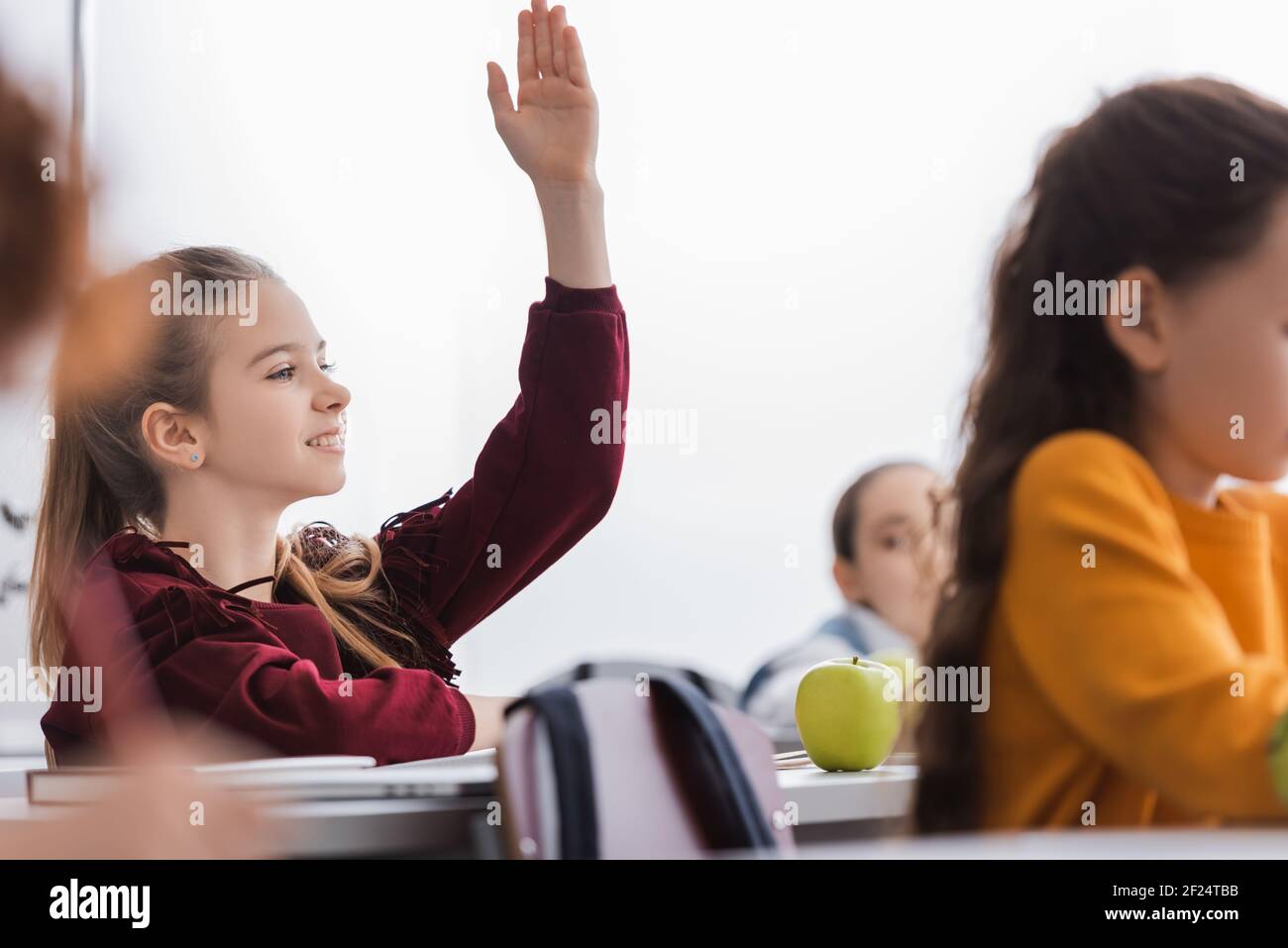Children raising hand classroom hi-res stock photography and images - Alamy