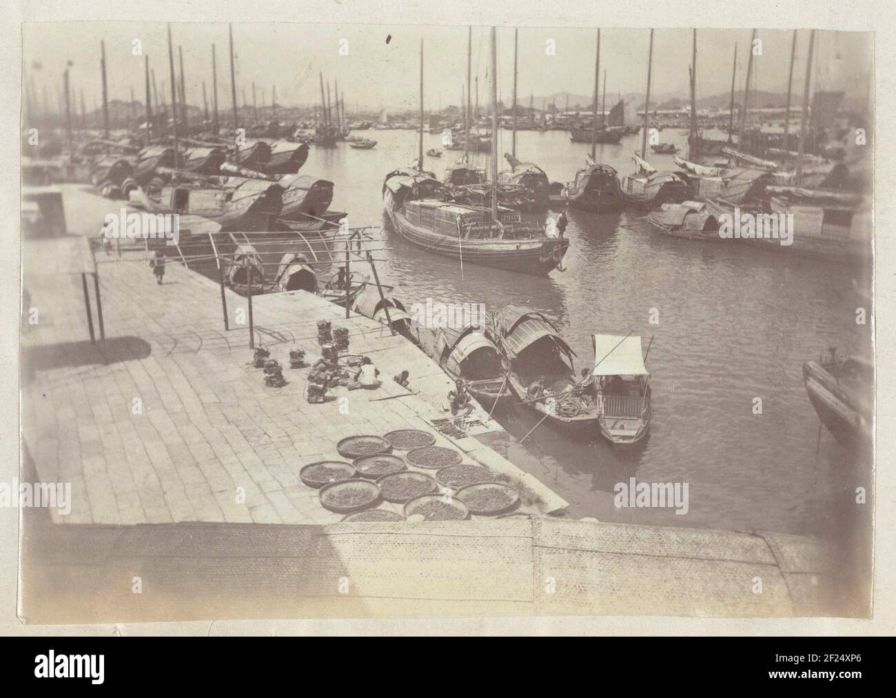 View of a Chinese harbor from the quay Stock Photo - Alamy